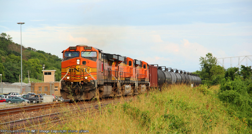 BNSF 5305 leads a empty crude oil train Nb.